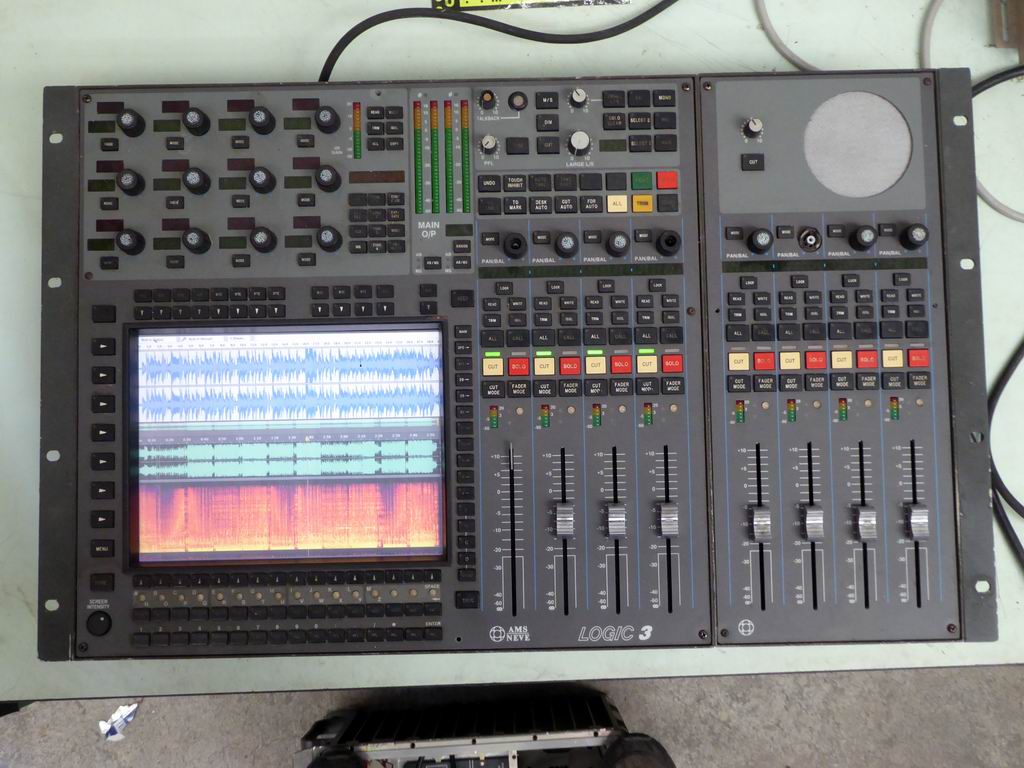 Large, very high tech looking practical control panel/audio console ...