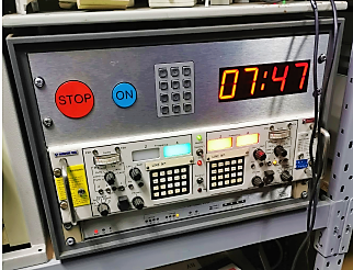 Desktop cabinet with microwave countdown timer and flashing lights ...