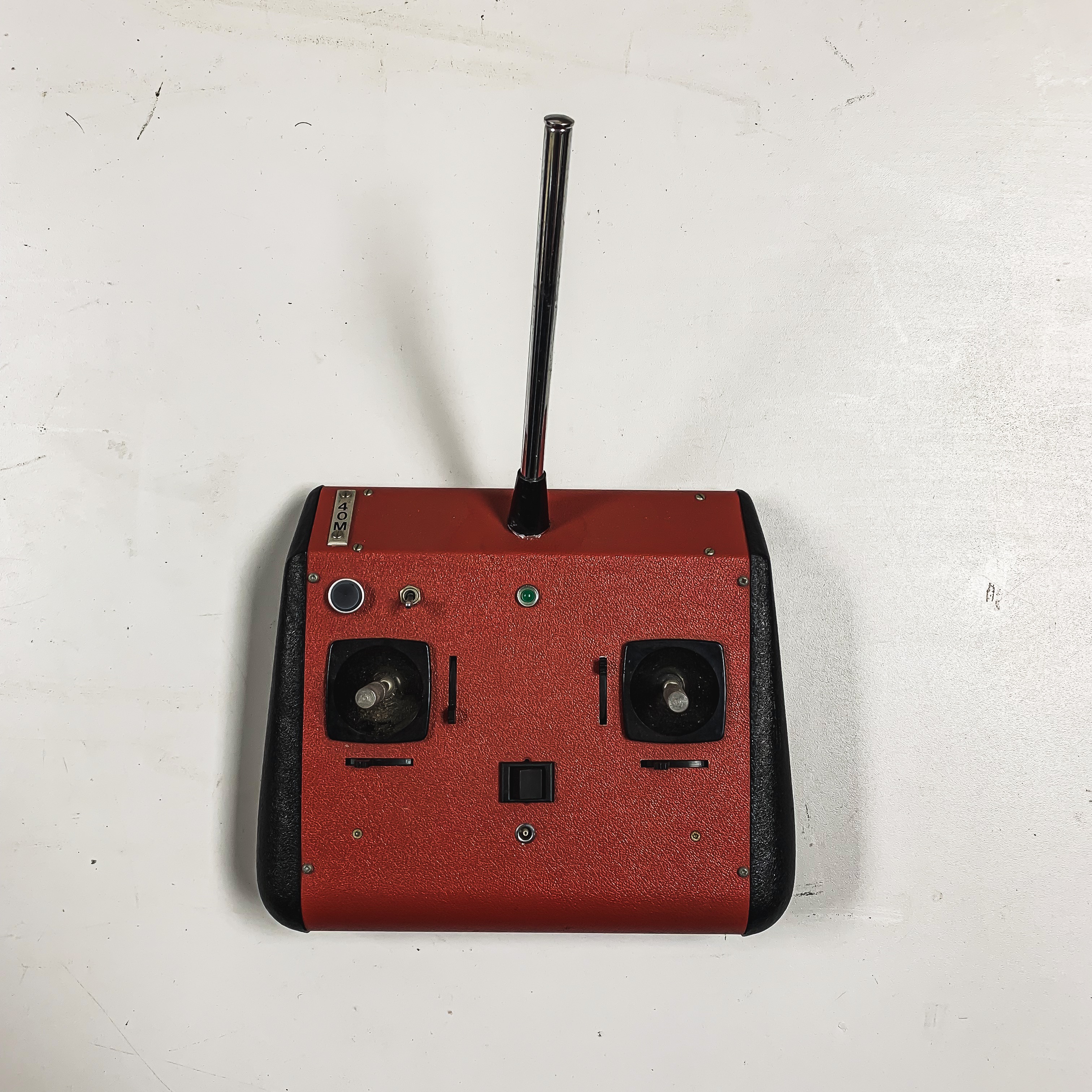 Red hobbyist RC remote control | Electro Props Hire