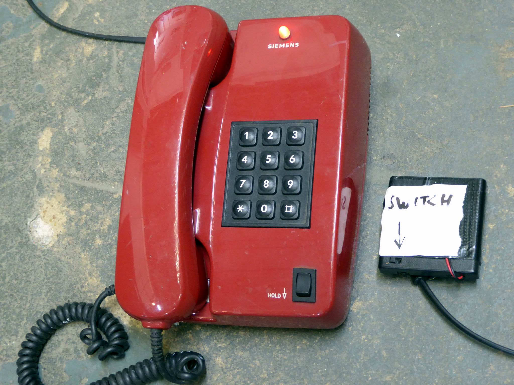 Red push button phone with remote controllable red lamp | Electro Props ...