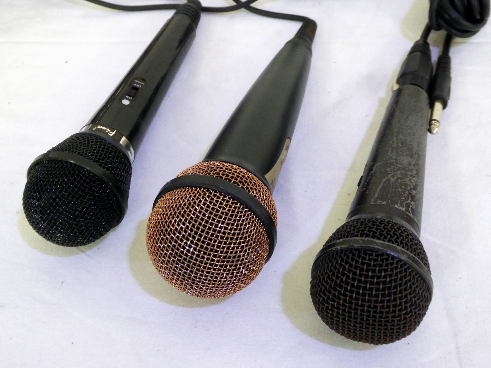 Assorted large, hand held, ball shaped microphones | Electro Props Hire
