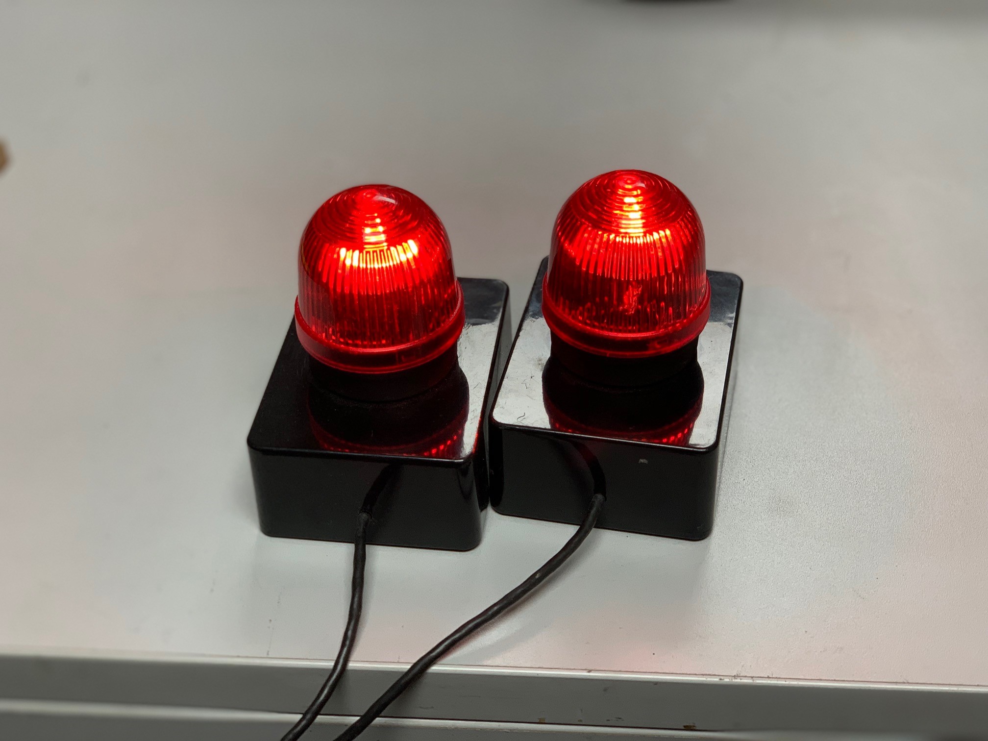 Practical small red beacon lights | Electro Props Hire