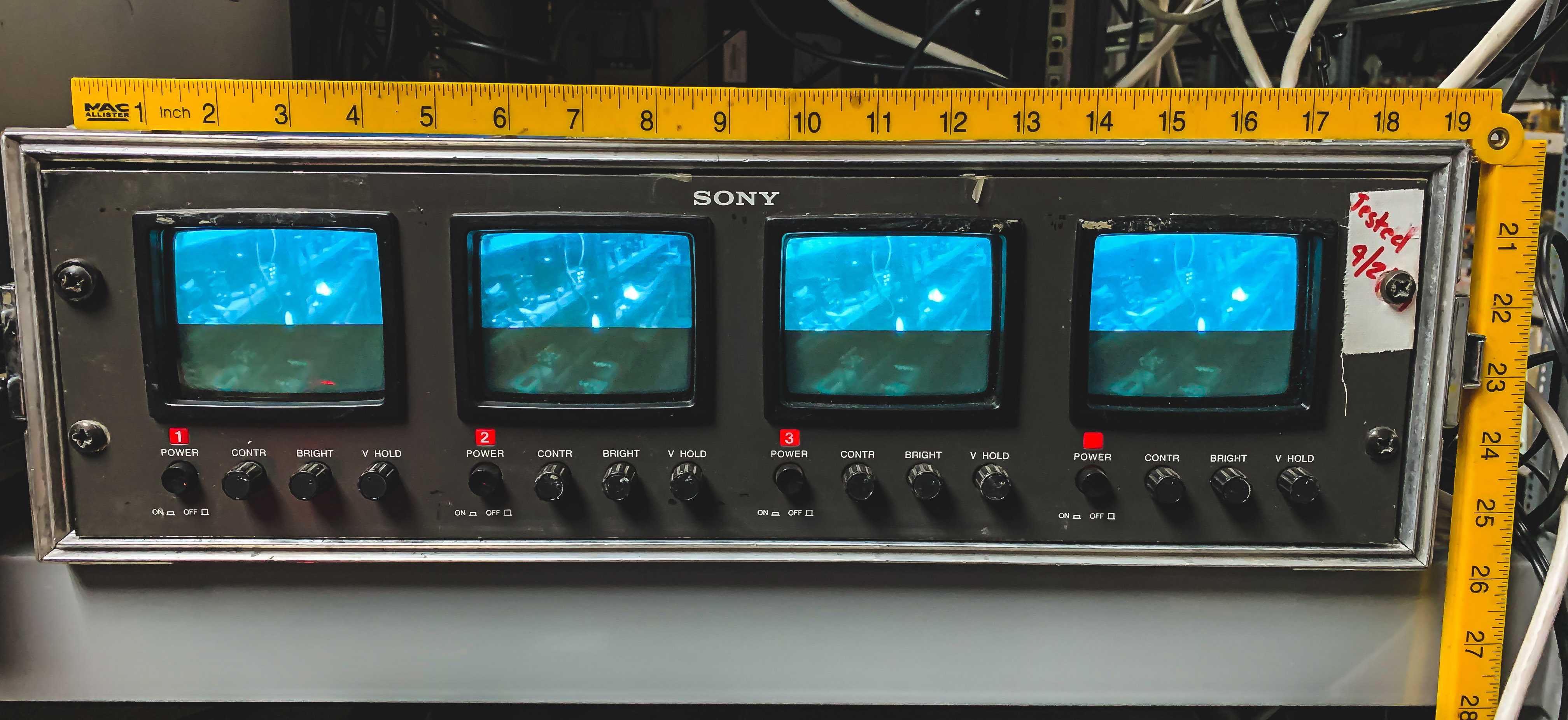 One bank of four 4" black and white CRT monitors | Electro Props Hire