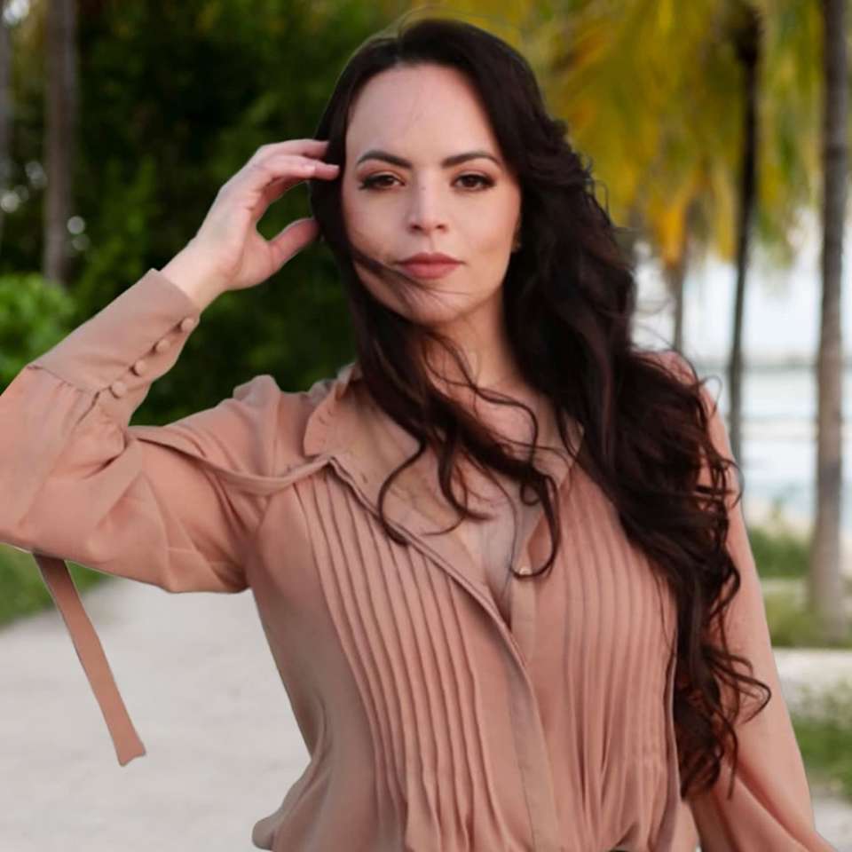 About Natasha E. Rodriguez