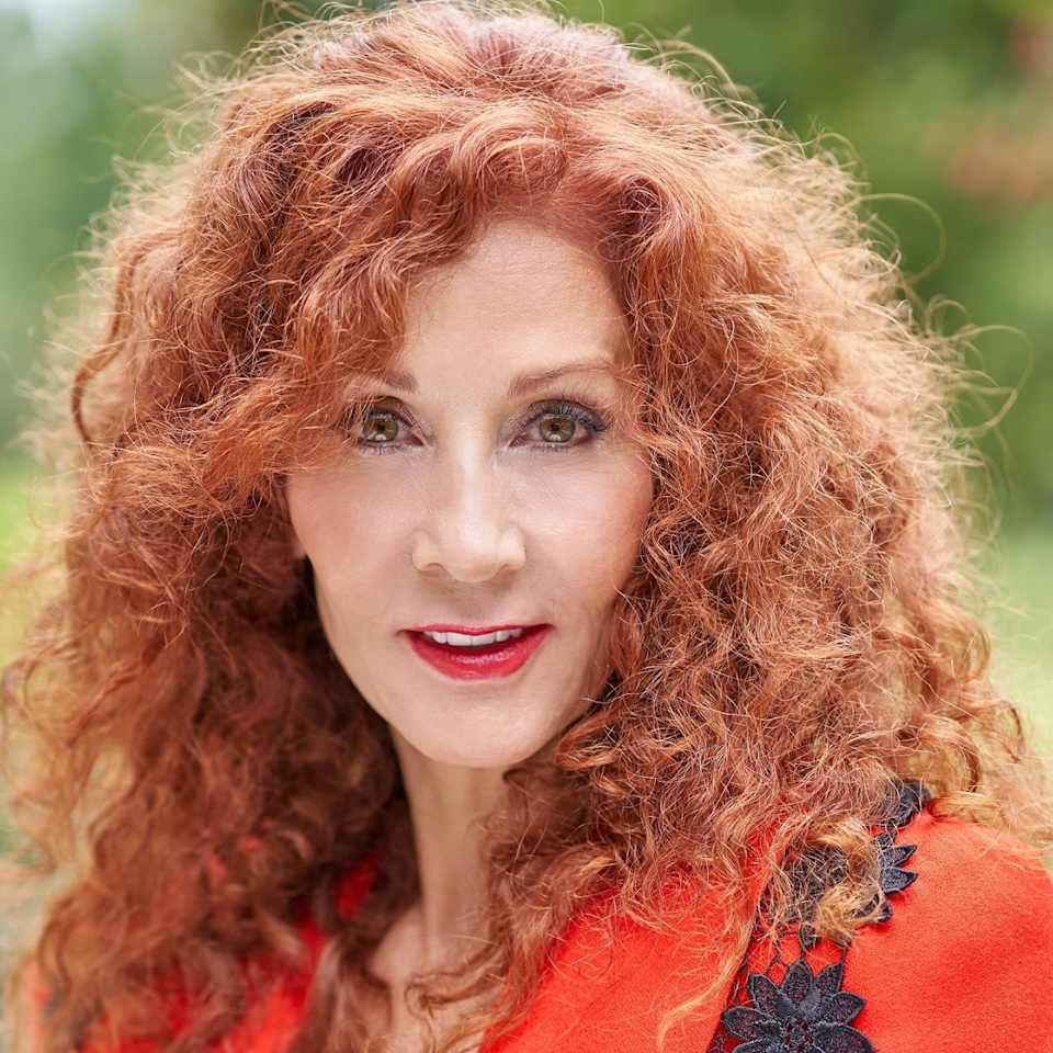 About Christa Dinallo