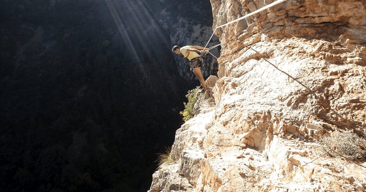 Vertical hiking in the Saint-Guilhem-le-Désert massif near Montpellier ...
