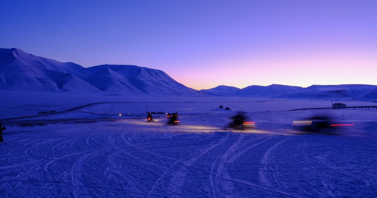 Blue Light Snowmobile Trip through Svalbard in Spring | Manawa