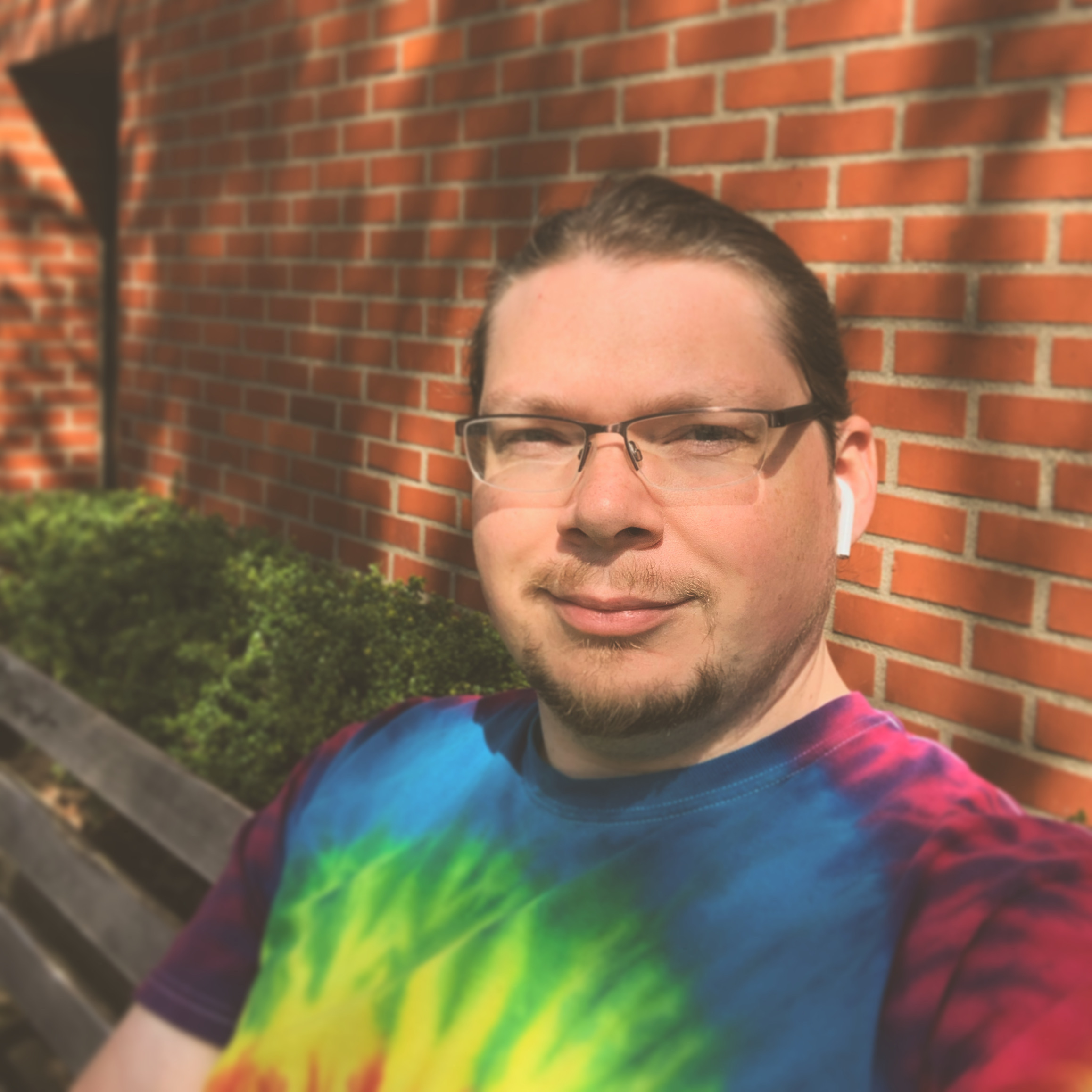 Picture: Sitting on a bench in the sun listening to a podcast. For a ...