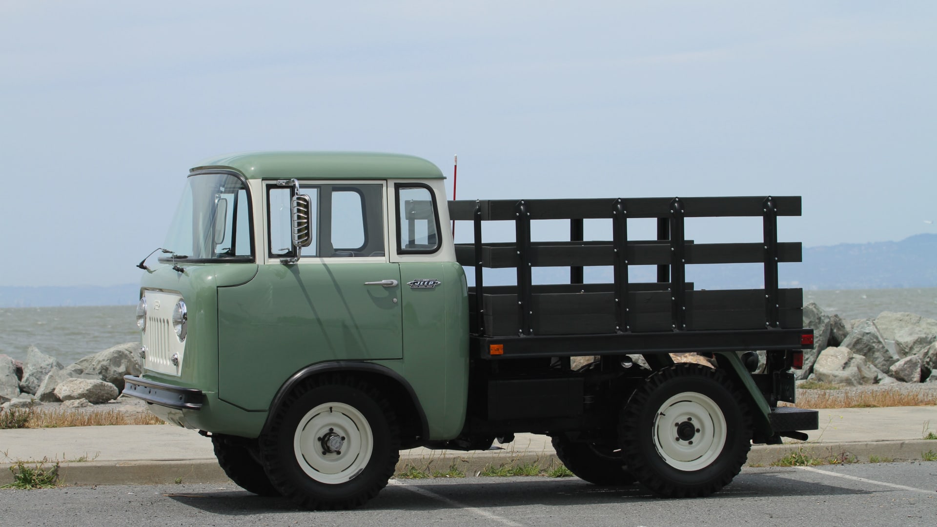 1957 Willys Jeep Stake Bed Truck at Monterey 2015 as T137 - Mecum Auctions