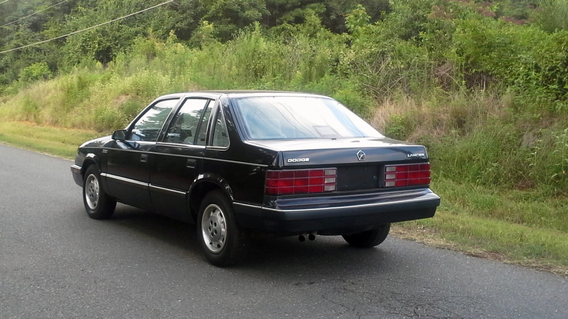 1986 Dodge Lancer at Dallas 2014 as T233 - Mecum Auctions