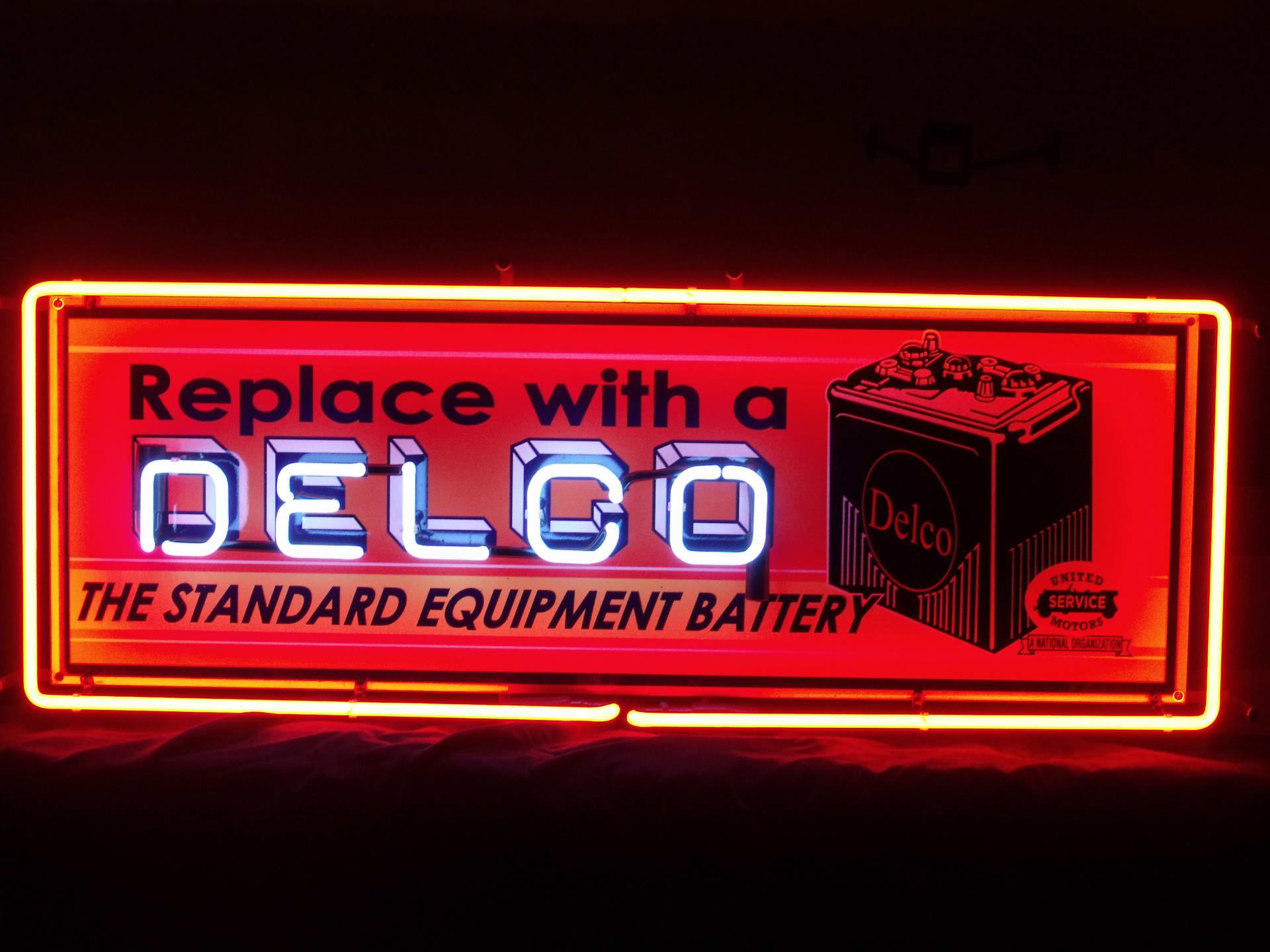 Delco Battery Neon Sign at Kansas City Spring 2012 as Z359 - Mecum Auctions