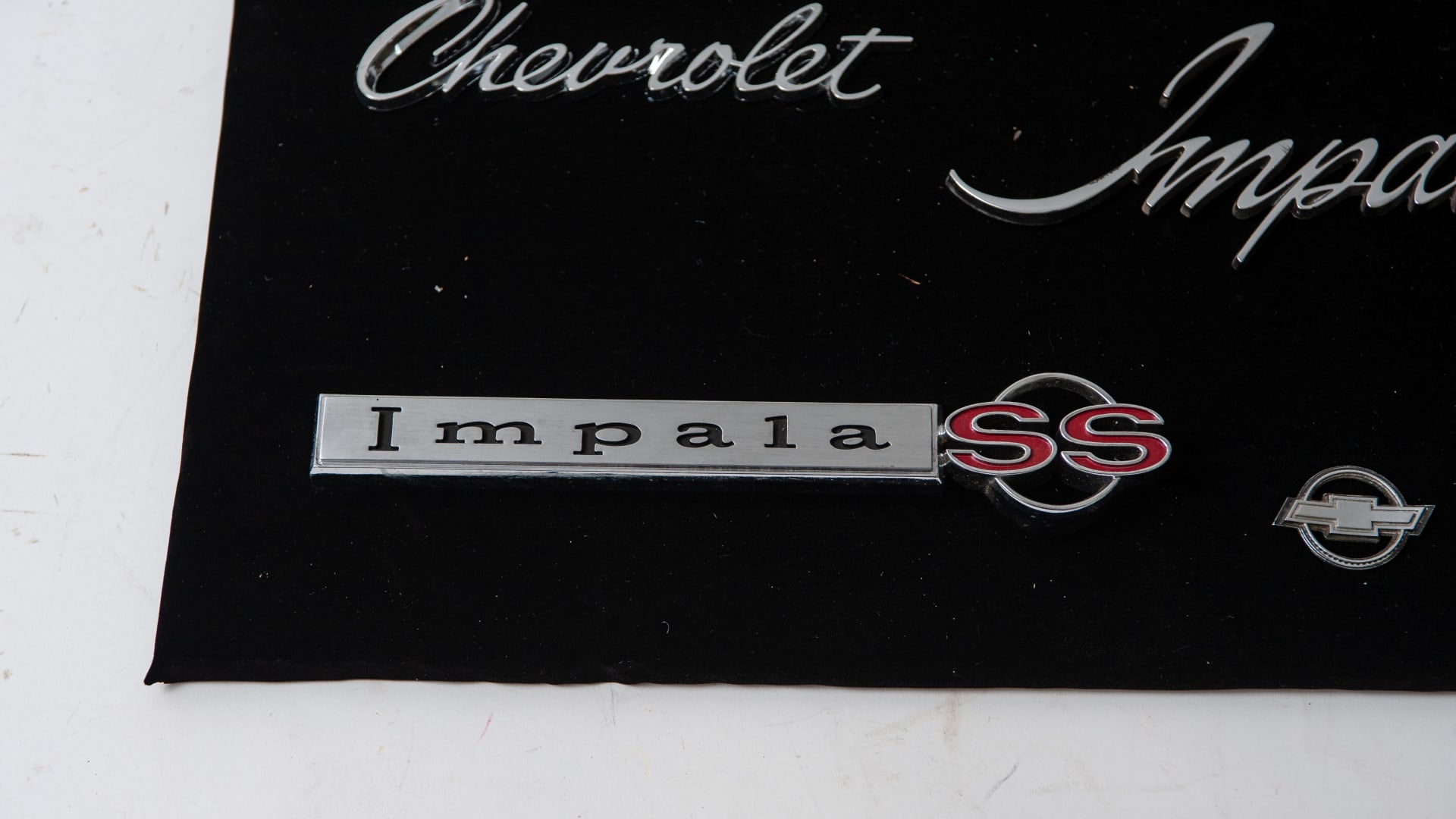 Chevrolet Impala Car Emblems at Indy Road Art 2021 as B207 - Mecum Auctions
