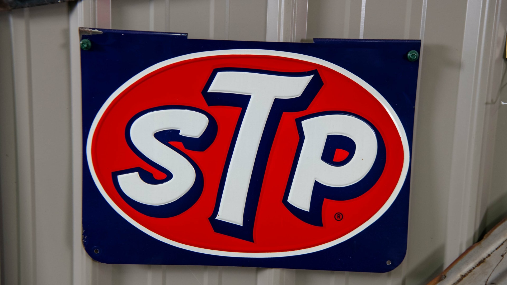 STP Single-Sided Tin Sign at Indy Road Art 2022 asE468 - Mecum Auctions