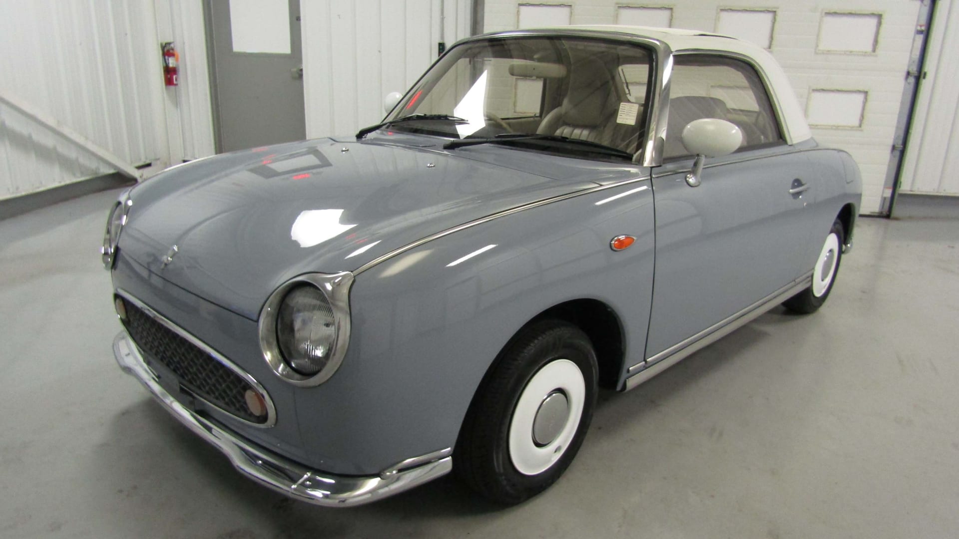 1991 Nissan Figaro Convertible at Indy 2019 as W124 - Mecum Auctions