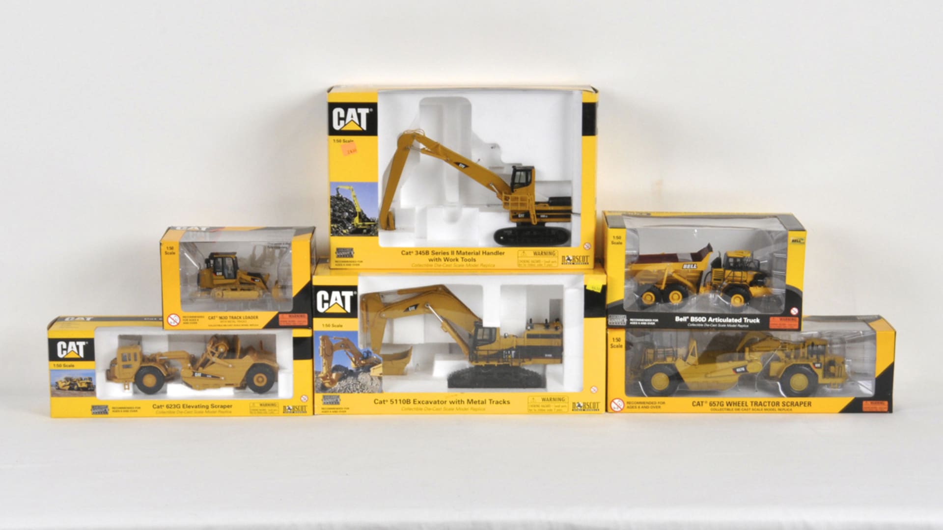 Caterpillar And Bell Model Tractors Lot Of 6 at The Toy Auction 2014 as ...