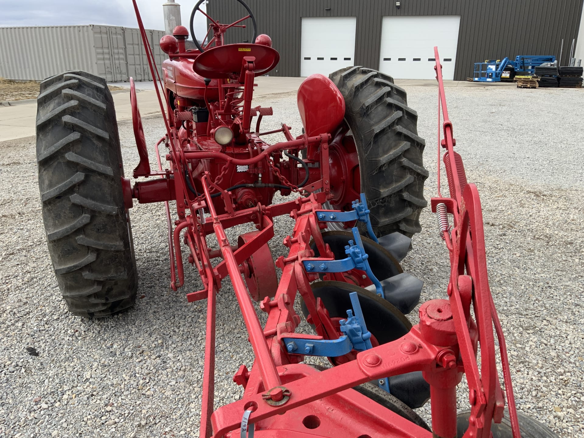 1948 Farmall M with 3-Bottom Disc Plow at Gone Farmin' Spring Classic ...