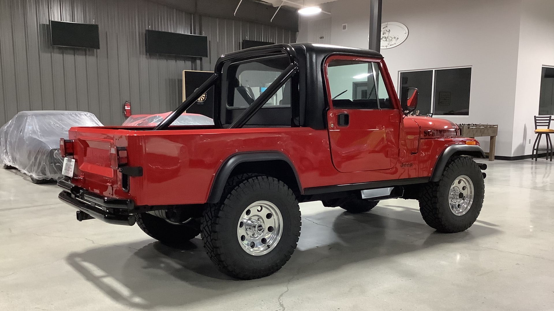 1982 Jeep CJ-8 Scrambler at Indy 2023 as W82 - Mecum Auctions