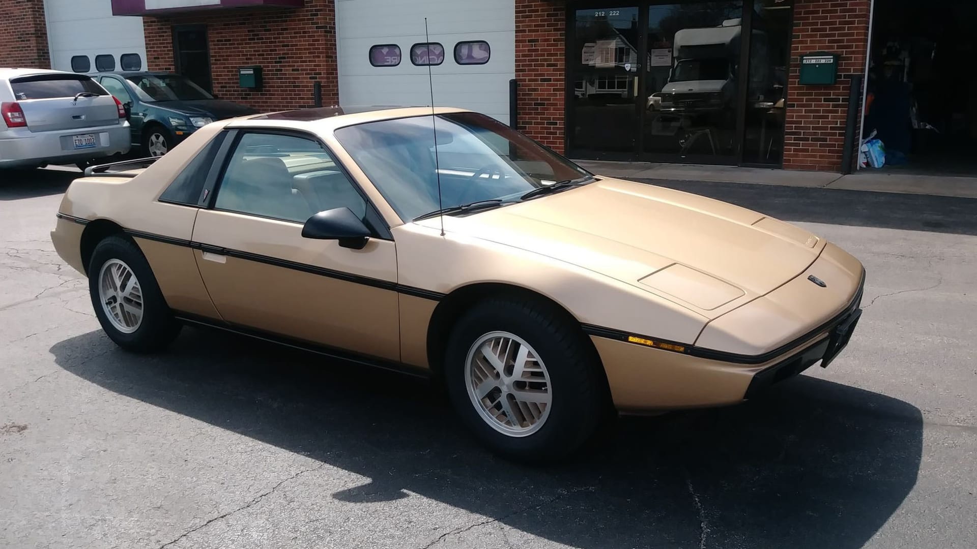 1986 Pontiac Fiero at Indy 2023 as J55 - Mecum Auctions