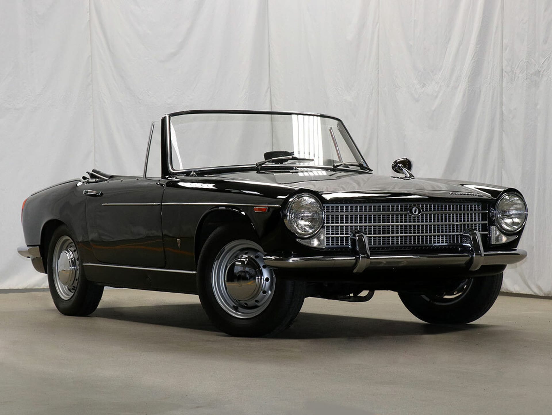 1965 Innocenti 1100 S Spider at Indy 2023 as G154 - Mecum Auctions