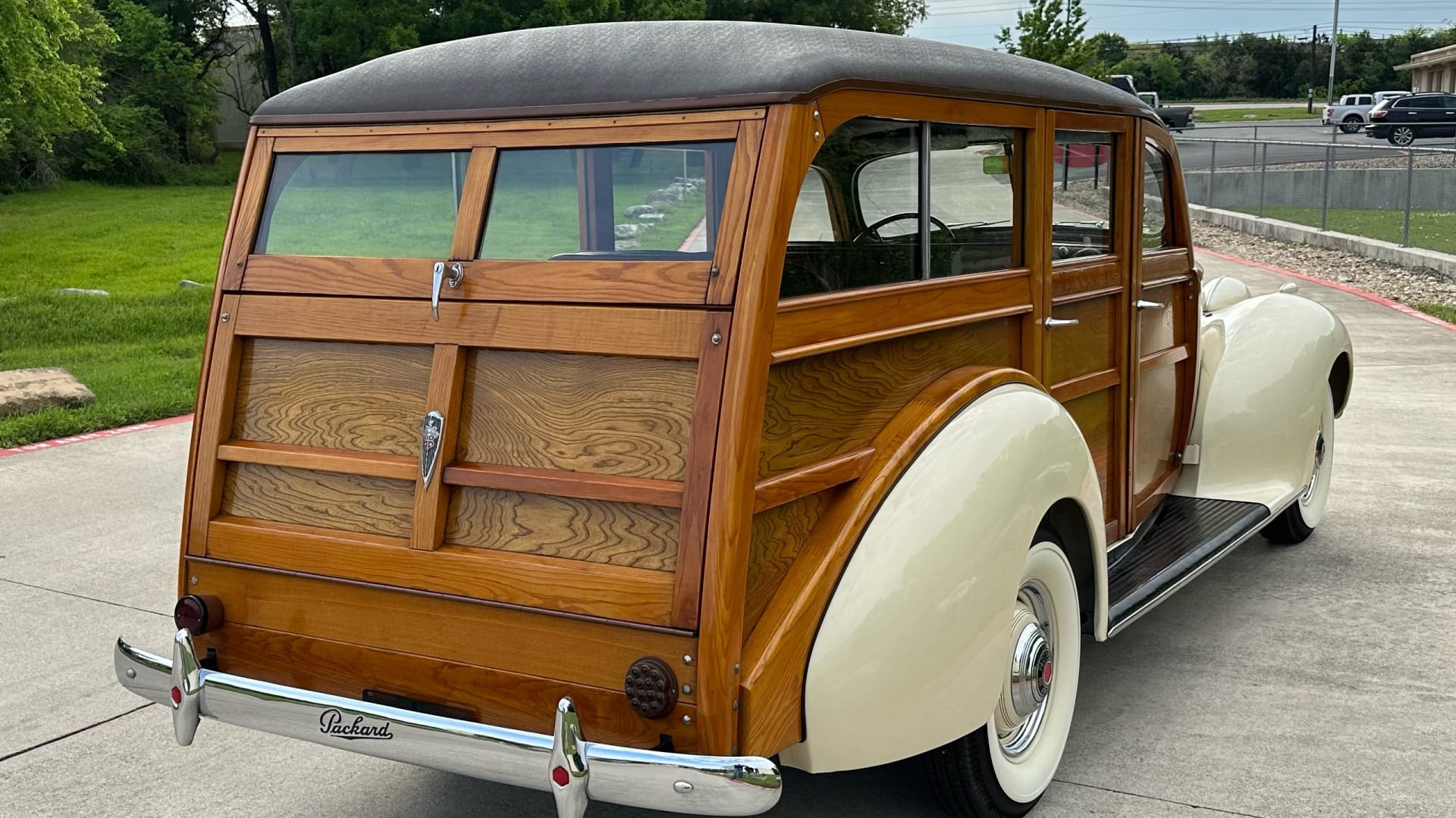 1940 Packard 110 Woody at Houston 2023 as S230 - Mecum Auctions