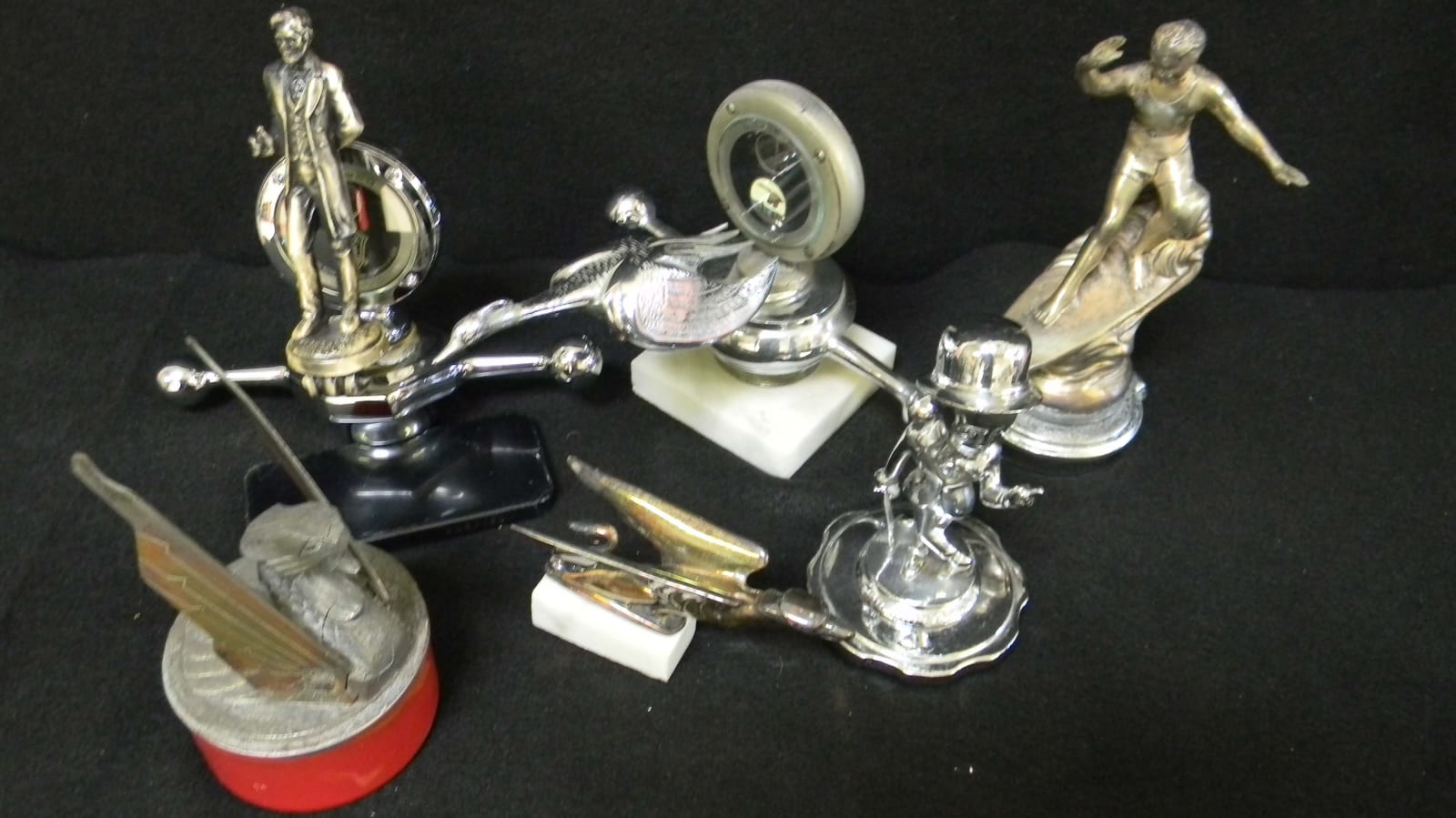 Radiator Caps And Griffin Mascot at Monterey 2014 as J36 - Mecum Auctions