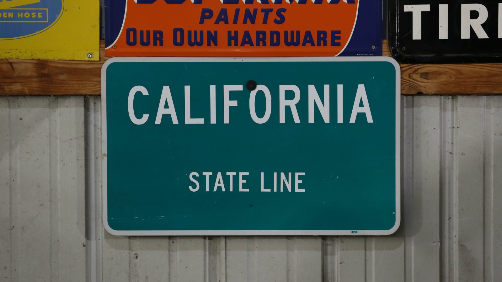 California State Line Single-Sided Tin Sign at Elmer's Auto & Toy ...
