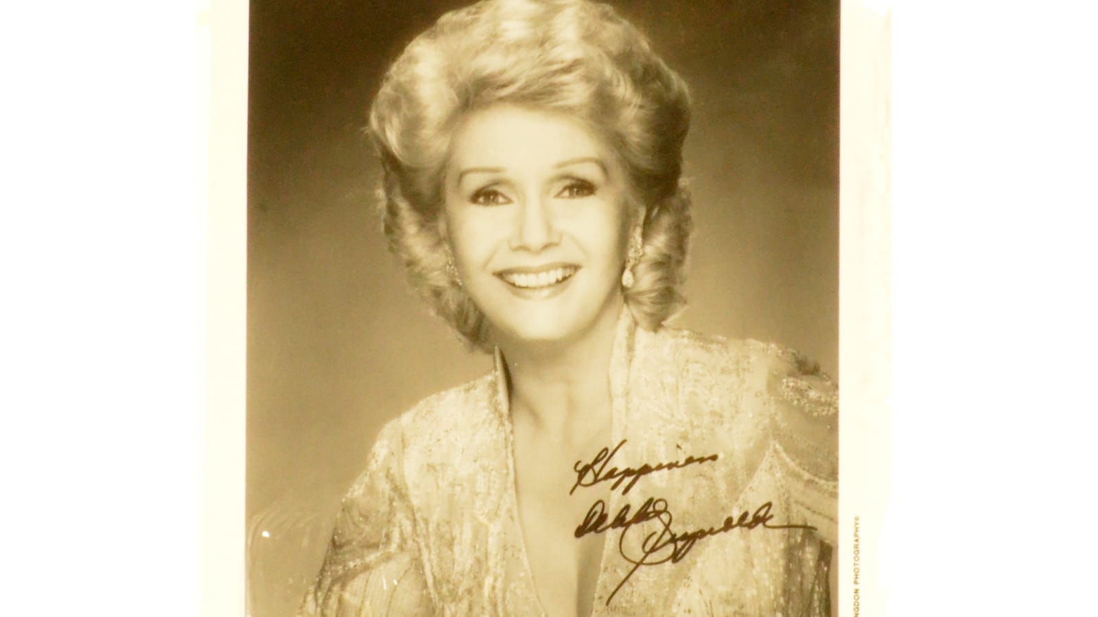 Debbie Reynolds Autographed Publicity Photo at Santa Monica 2013 as J408 - Mecum Auctions
