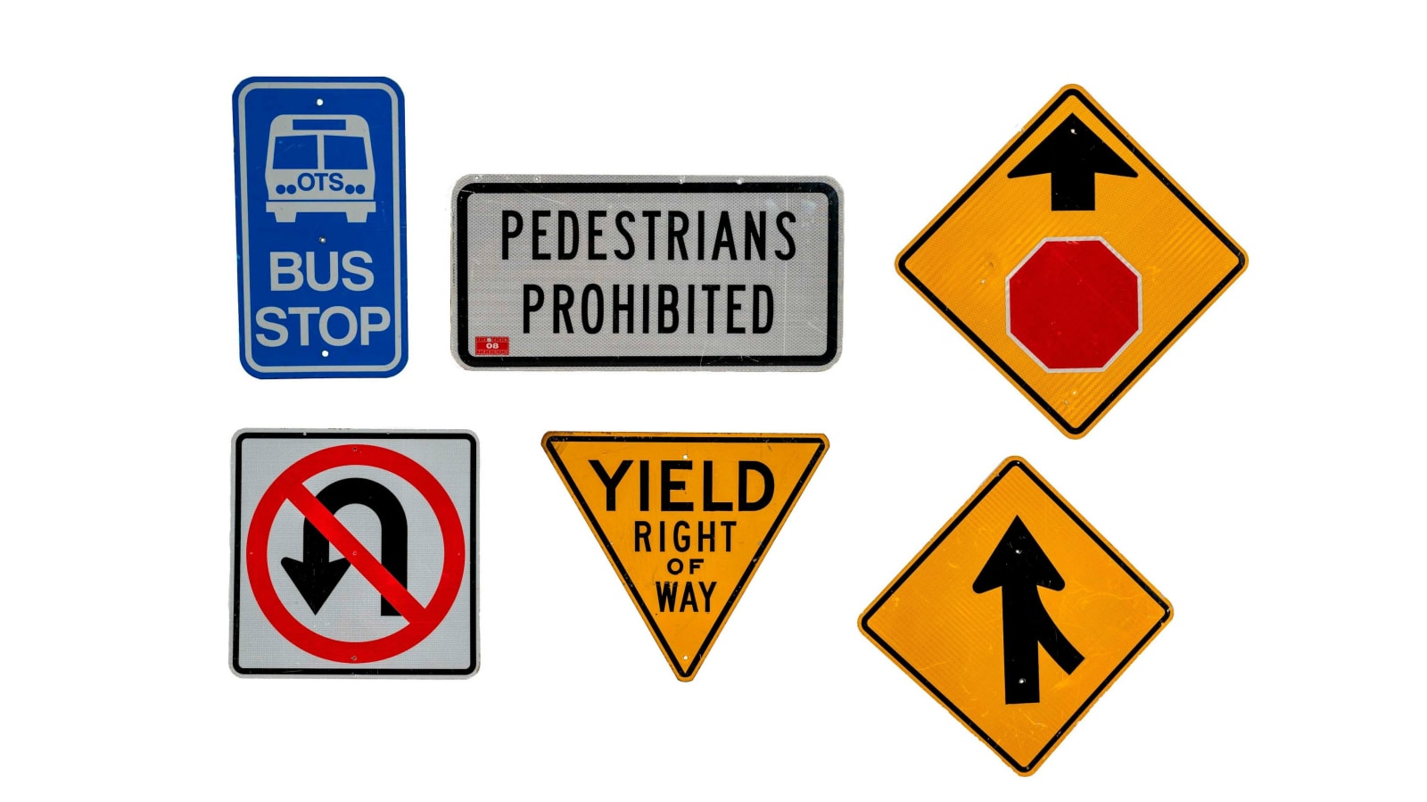 Bus Stop, No U Turn, Stop, Pedestrian, Yield and Merging Lane Signs at ...