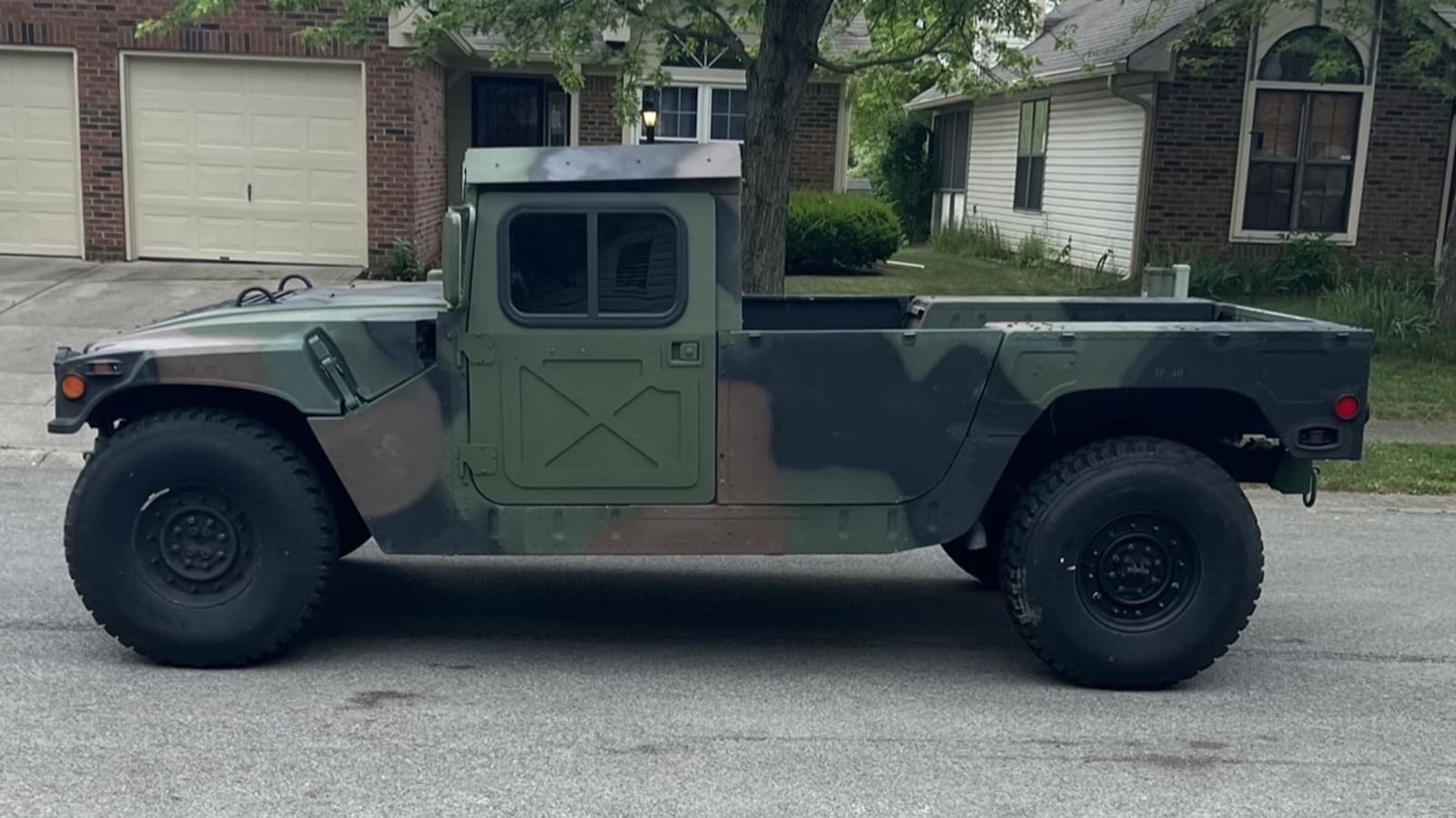 2009 AM General Humvee at Indy 2023 as L172 - Mecum Auctions