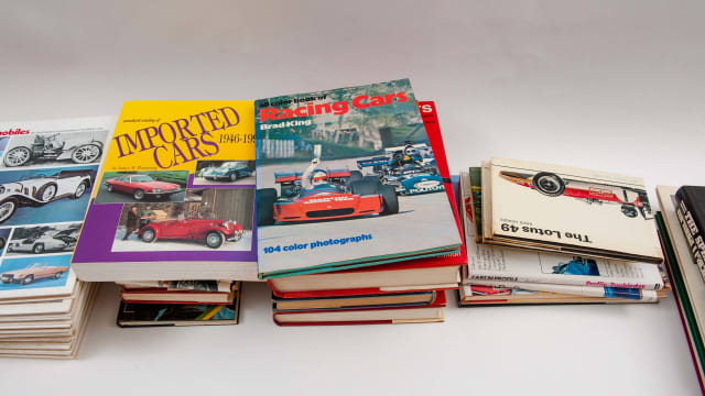 Variety Of Racing Books at Indy Road Art 2021 as B137 - Mecum Auctions