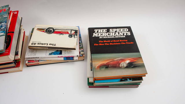 Variety Of Racing Books at Indy Road Art 2021 as B137 - Mecum Auctions