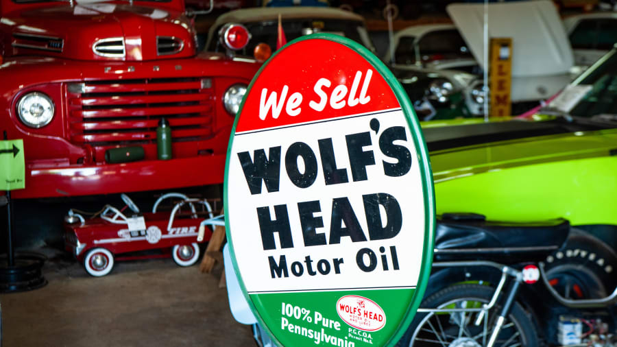 Wolf's Head Motor Oil Double-Sided Porcelain Curb Sign at Elmer's Auto ...