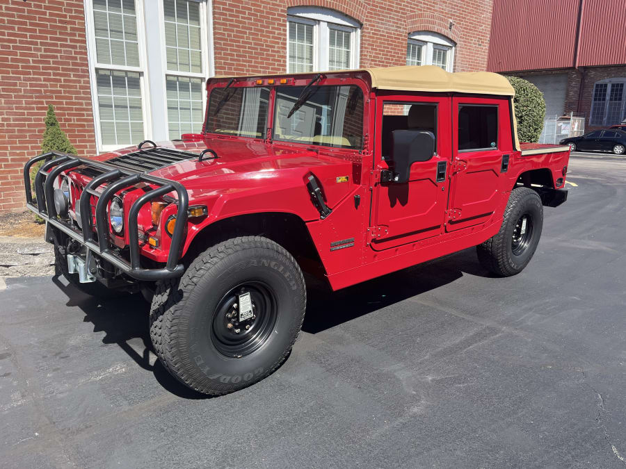 1999 Am General Hummer H1 at Dallas 2022 as S64 - Mecum Auctions