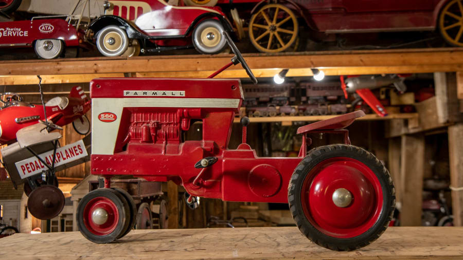 Farmall 560 Pedal Tractor at Elmer's Auto & Toy Museum Collection 2022 as W319 - Mecum Auctions