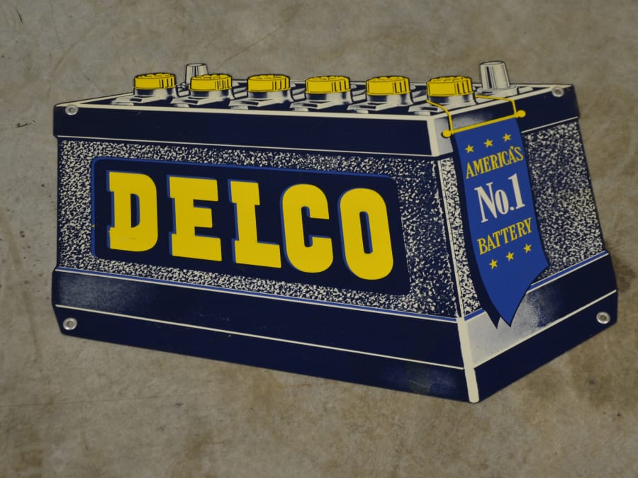 Delco Battery Sign DST 17x23 at Kissimmee 2014 as M336 - Mecum Auctions