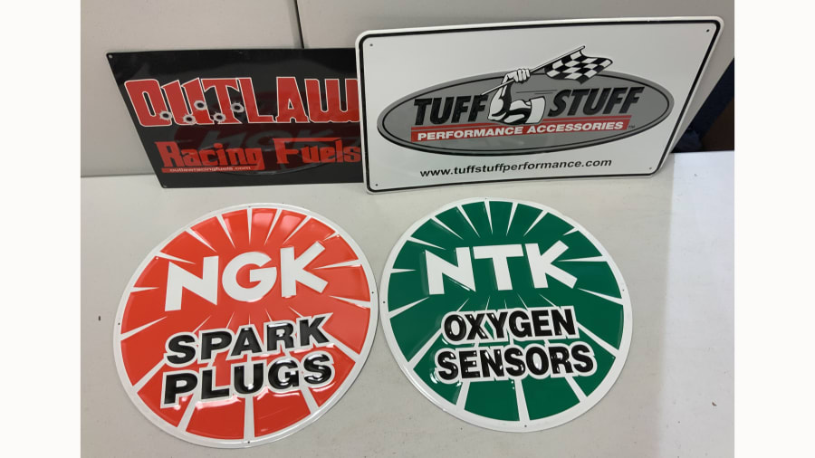 Outlaw, Tuff Stuff, And Ngk Signs at Punta Gorda 2021 as P274 - Mecum ...