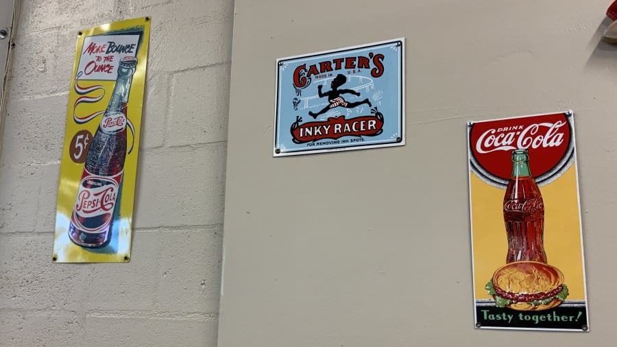 Pepsi-Cola, Carters, And Coca-Cola Signs at Punta Gorda 2021 as H47 - Mecum Auctions