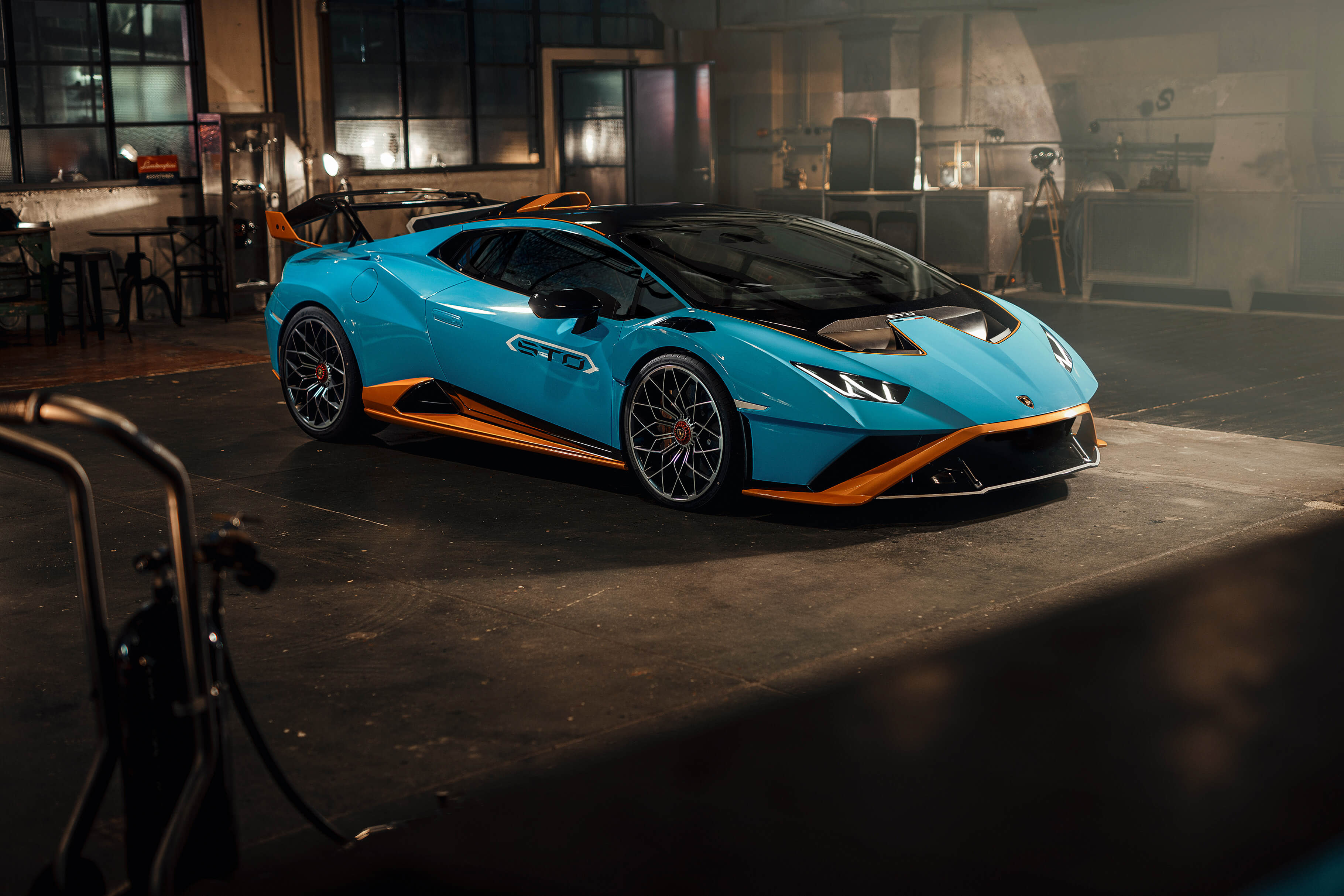 Lamborghini Huracán STO driving at high speed on a track with motion ...