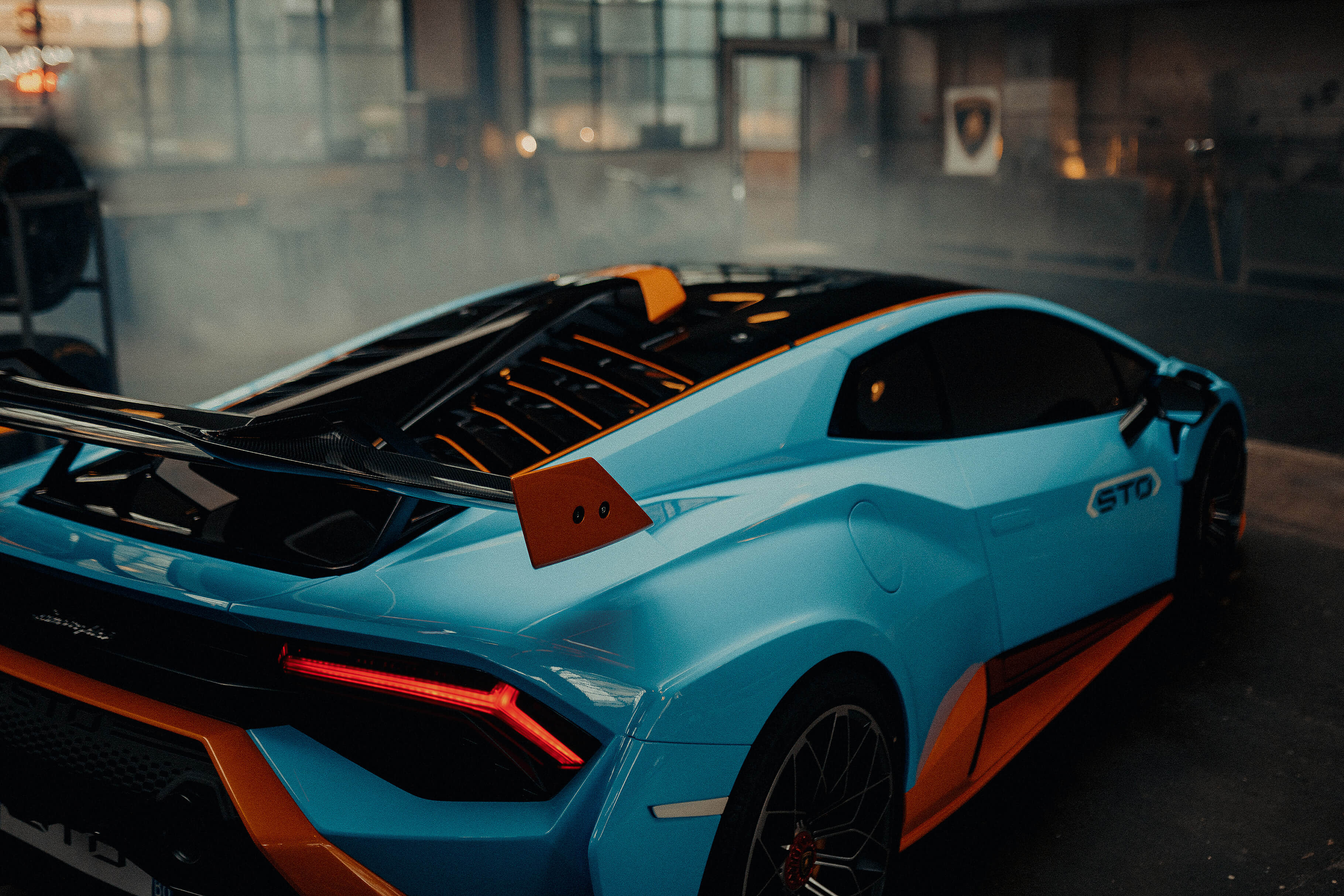 Lamborghini Huracán STO driving at high speed on a track with motion ...