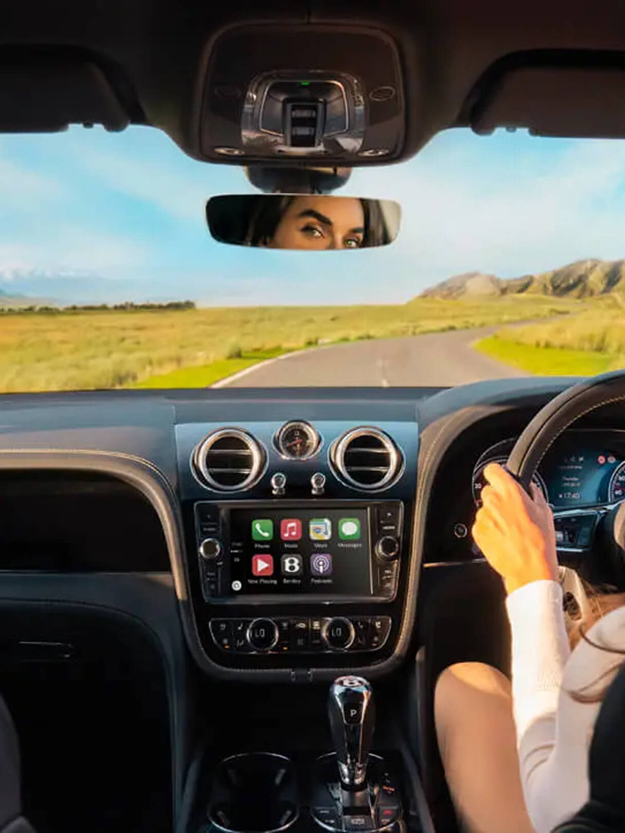 Driver's view of a Bentley interior showcasing the touchscreen ...