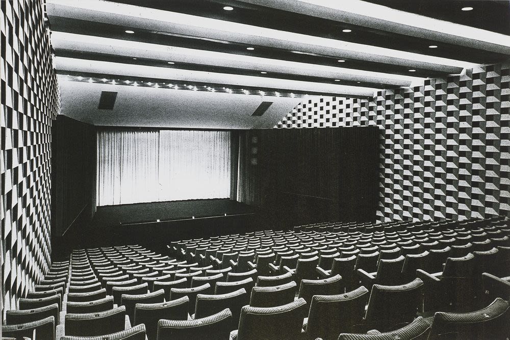 Photograph, interior of theatre showing teak-ribbed panels of forestage ...