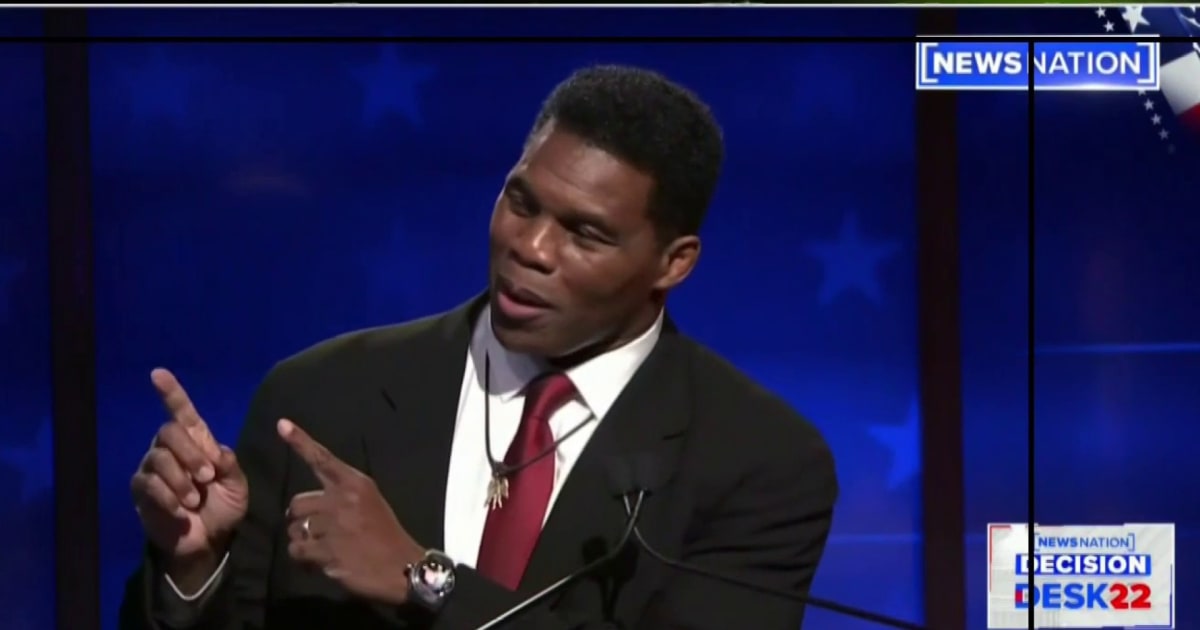 Discussing Senate Races: Herschel Walker takes out prop on stage at the ...