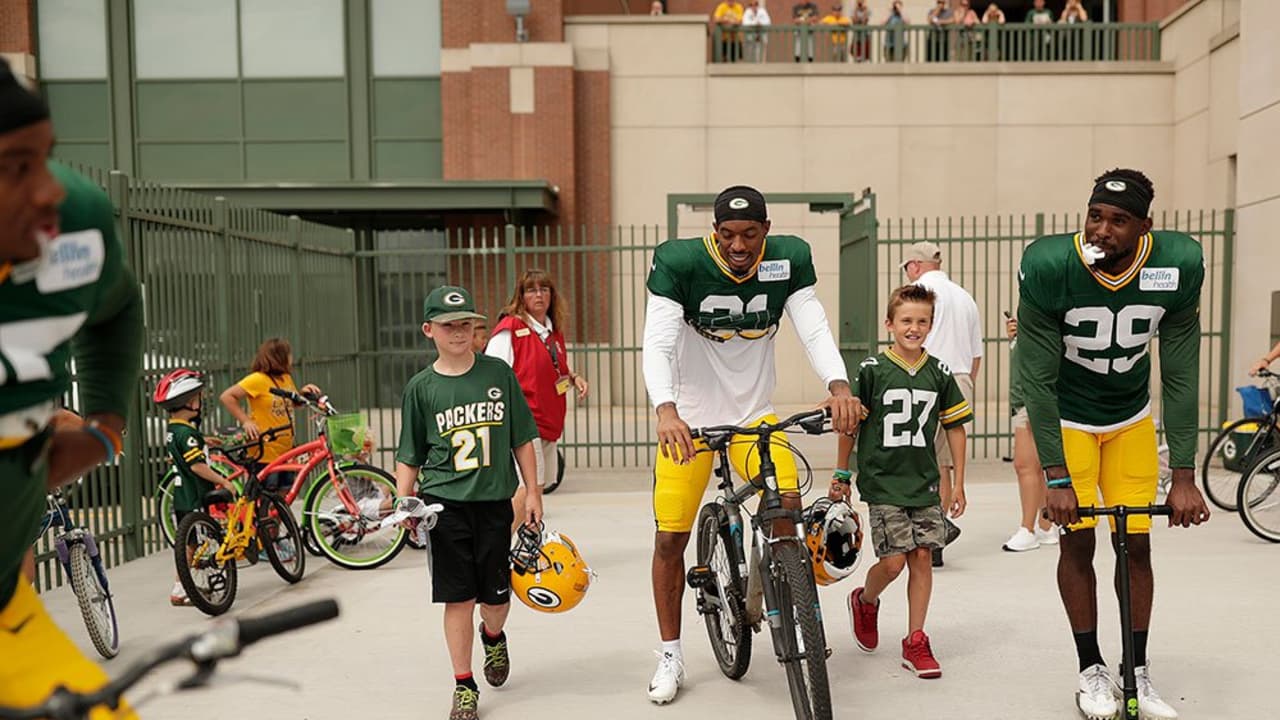 Cruising to Packers practice on bikes