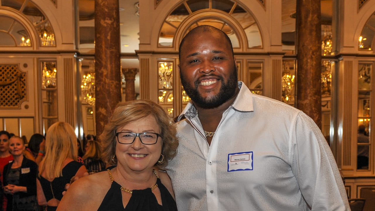 Marcus Cannon's family walks in charity fashion show