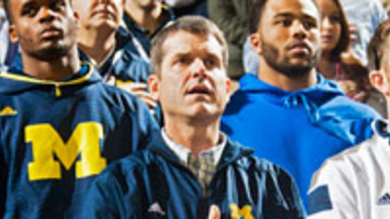 Jim Harbaugh rescues motorist in Michigan highway crash