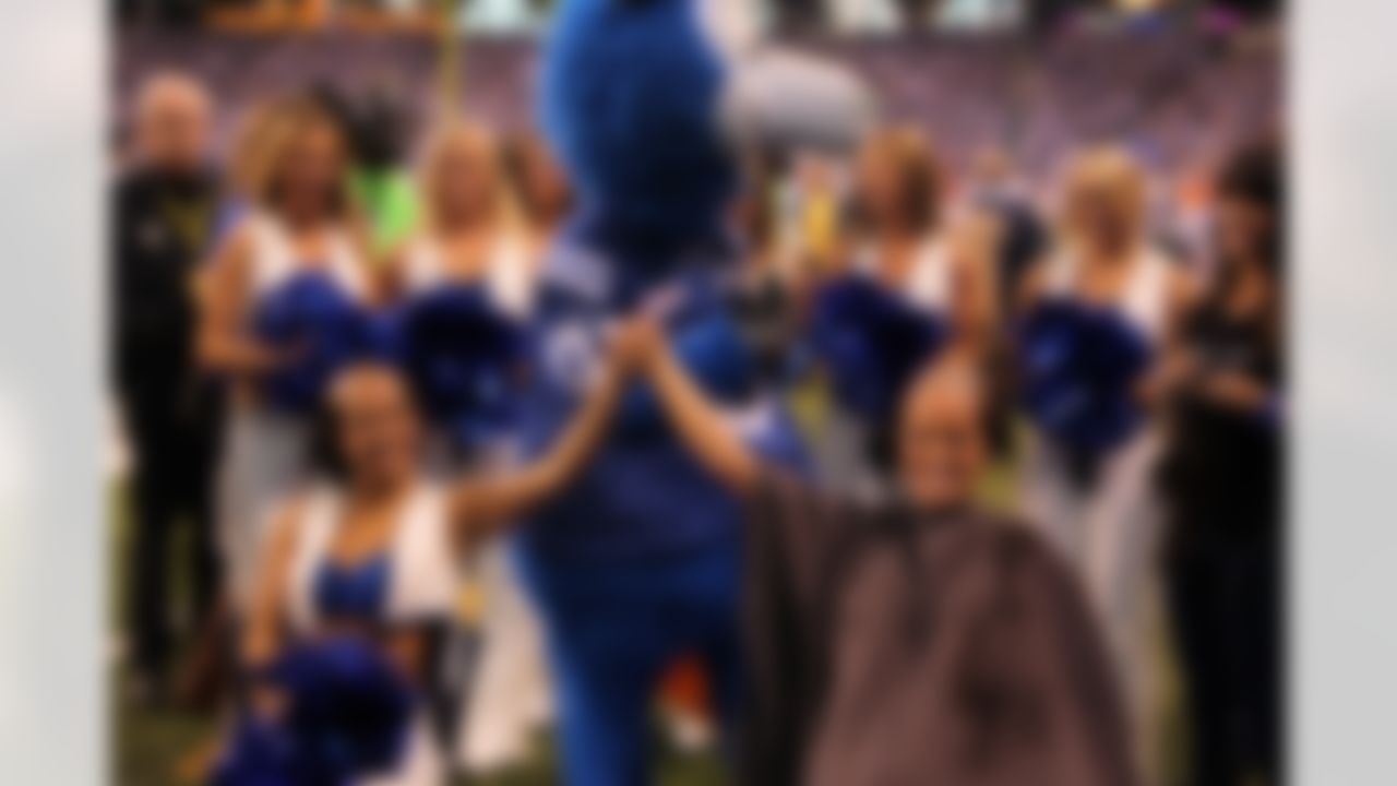 Cheerleaders Shave Heads for Pagano