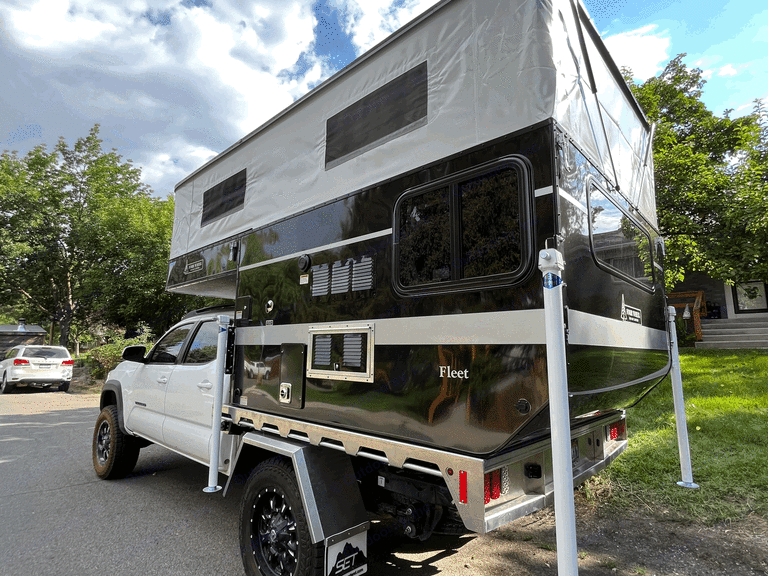 2022 Four Wheel Campers 2018 Tacoma with 2022 Fleet Flatbed Truck ...