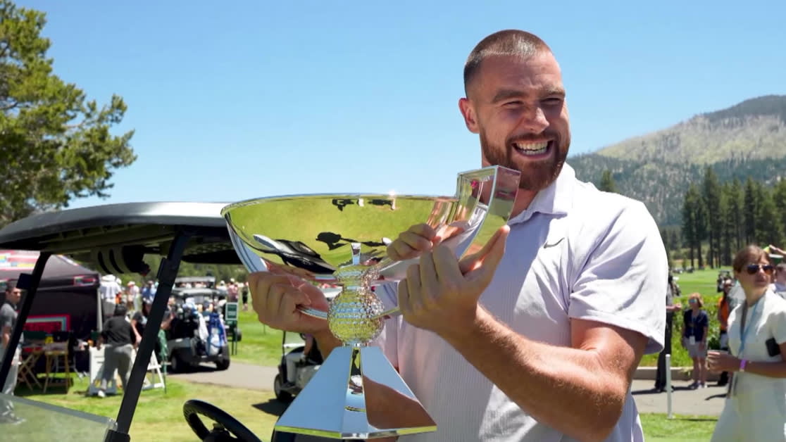 Celebrities and professional athletes check out the FedExCup Trophy