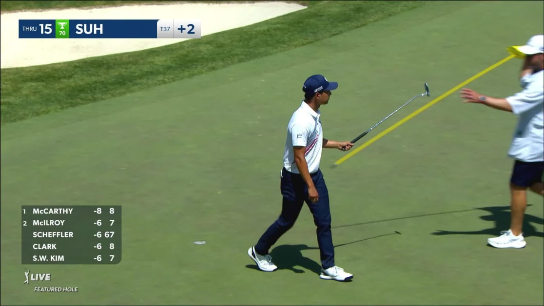 Justin Suh reaches in two to set up birdie at the Memorial