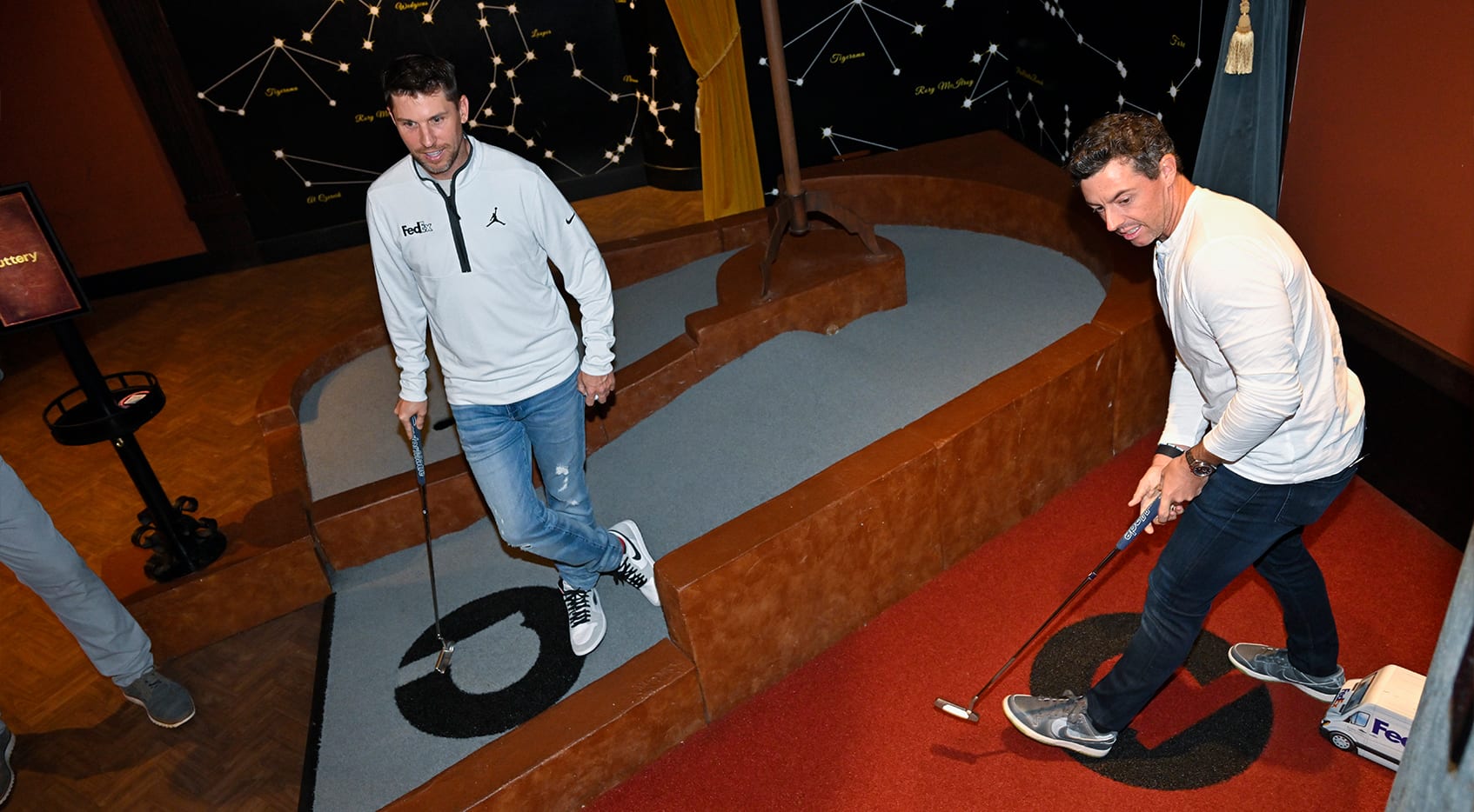 Rory McIlroy, Denny Hamlin celebrate FedEx’s 50th birthday with putting ...